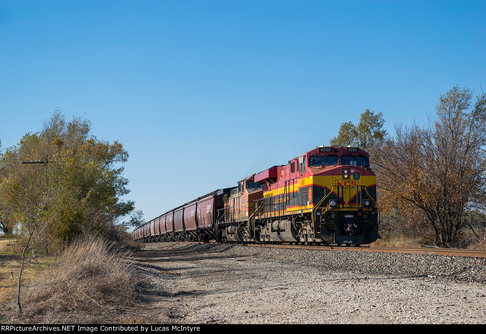 KCS 4690 DPU on westbound BNSF empty grain train